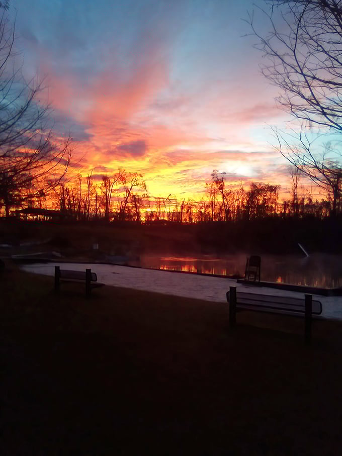 Sunset transforms Blue Springs into a painting of fiery skies reflected in still waters &ndash; nature showing off its evening wardrobe.