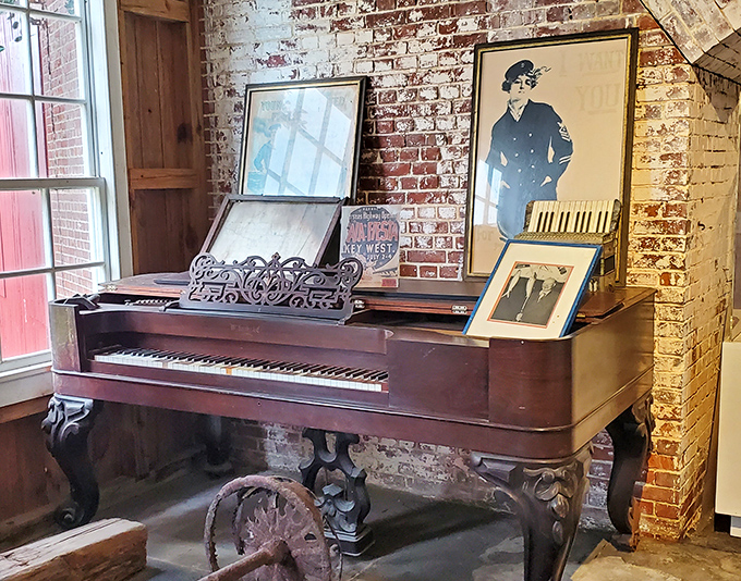 The grand piano stands in elegant contrast to its military surroundings, a reminder that music finds its way into every human space.