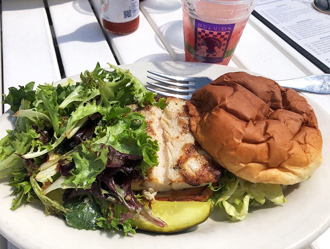 Grilled fish sandwich: Beach lunch perfection &ndash; flaky white fish, fresh greens, and a pillowy bun that makes you wonder why all sandwiches can't be this good.