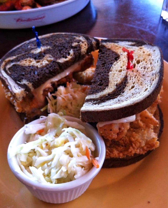 Florida's brilliant seafood twist on a deli classic, served with coleslaw that provides the perfect crisp counterpoint.