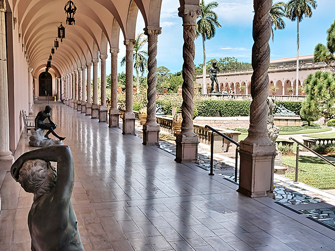 Twisted columns frame the walkway like something from a dream, making even a simple stroll feel like a grand procession.