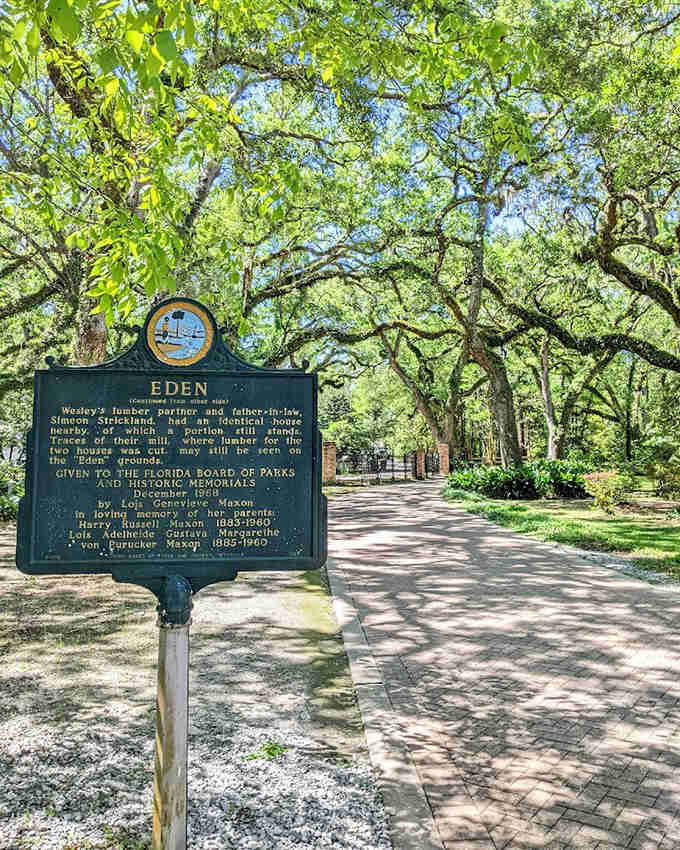 History rooted in place. This marker tells the tale of Eden Gardens' fascinating past, where lumber barons once walked among these same trees.