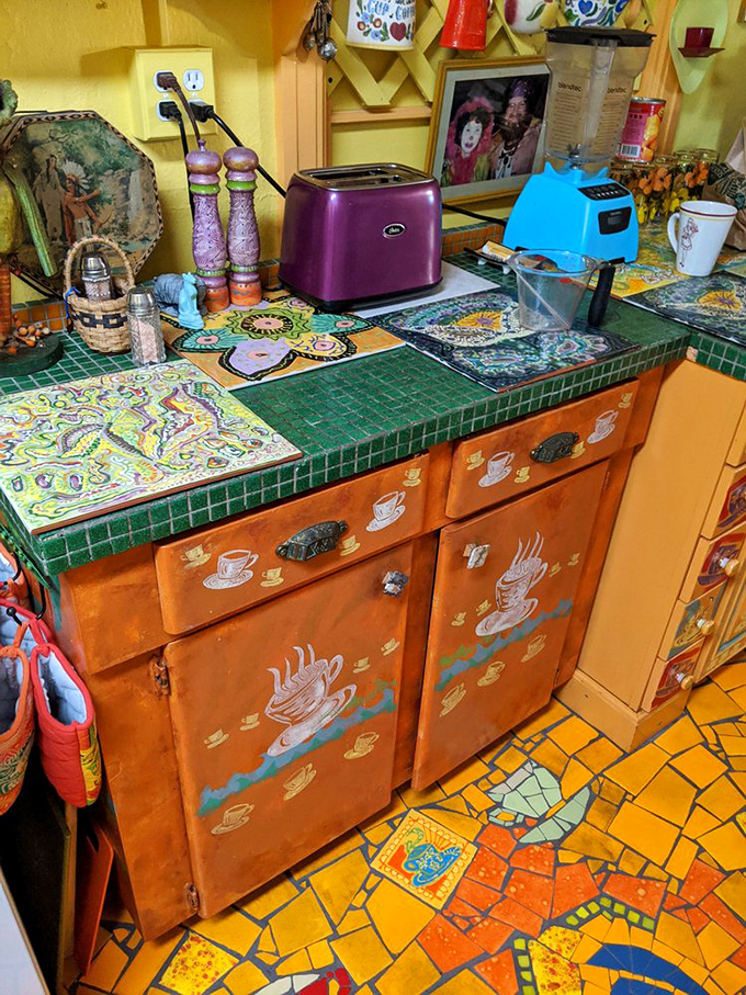 The kitchen proves that cooking doesn't have to happen in a sterile white space &ndash; those coffee cup motifs probably make morning caffeine taste better.