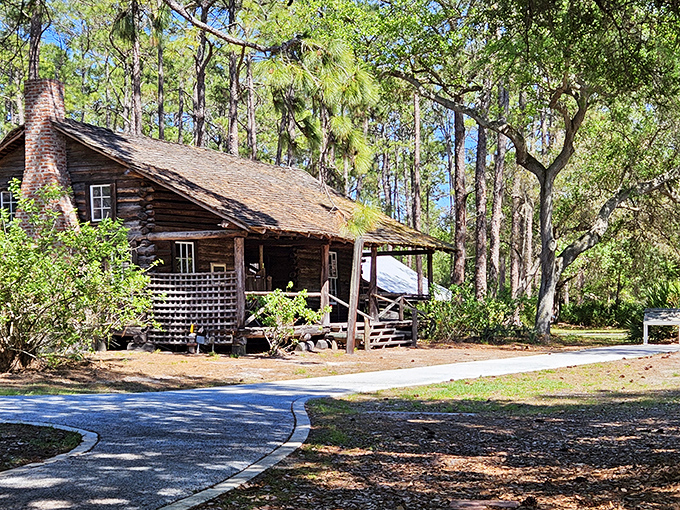 This rustic log cabin whispers stories of Florida's pioneer days, when air conditioning was just a pleasant daydream.