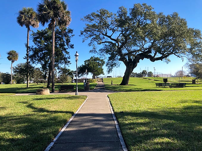 Winding pathways guide visitors through Old Fort Park's verdant grounds, where history and nature have reached a peaceful compromise.
