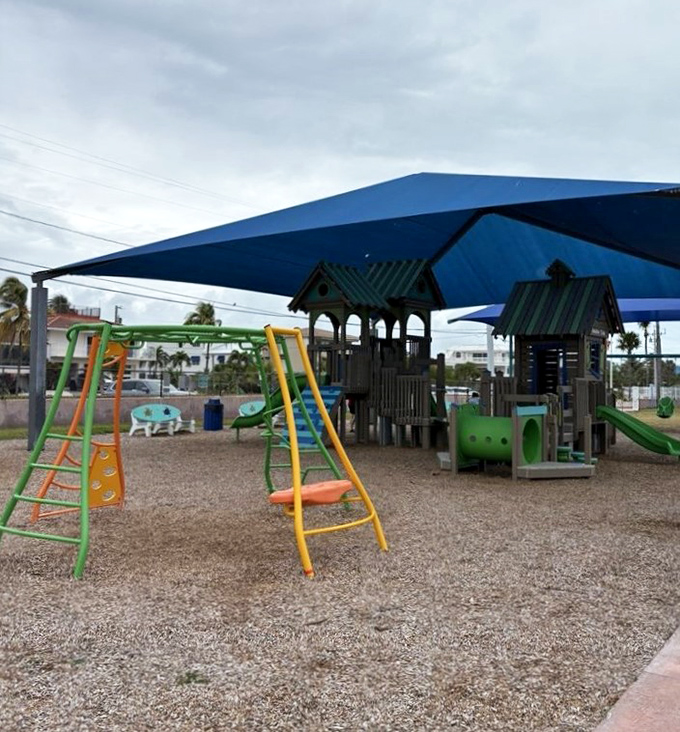 Kid-tested, parent-approved: The playground provides the perfect energy outlet when little ones need a break from sandcastle engineering.