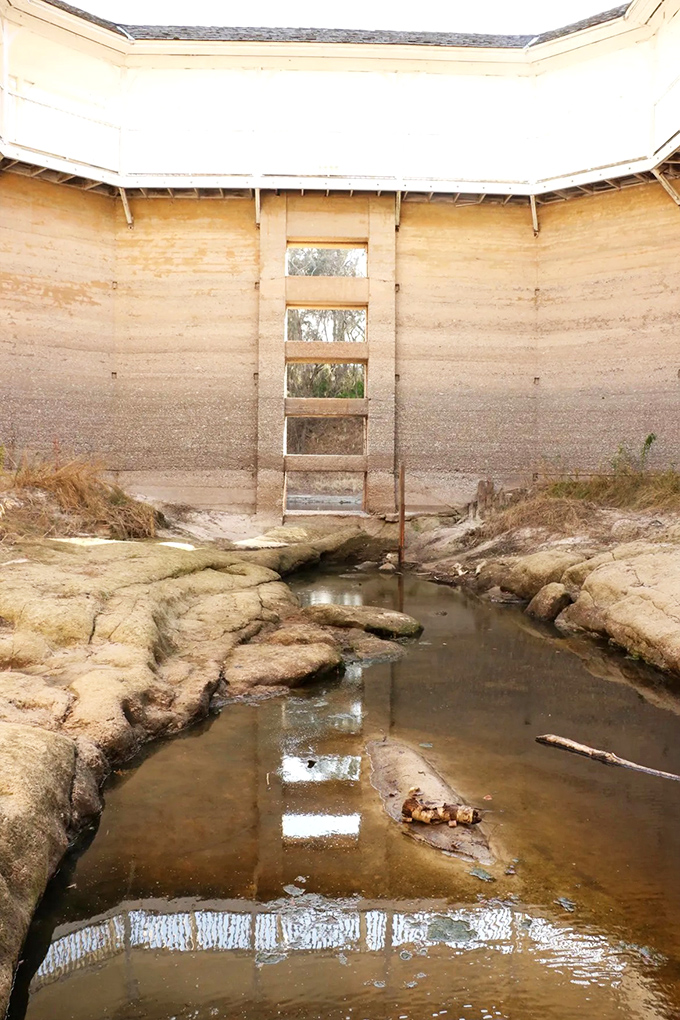 The spring's rocky bed reveals itself during low water, like an archaeological dig into Florida's earliest tourism industry.