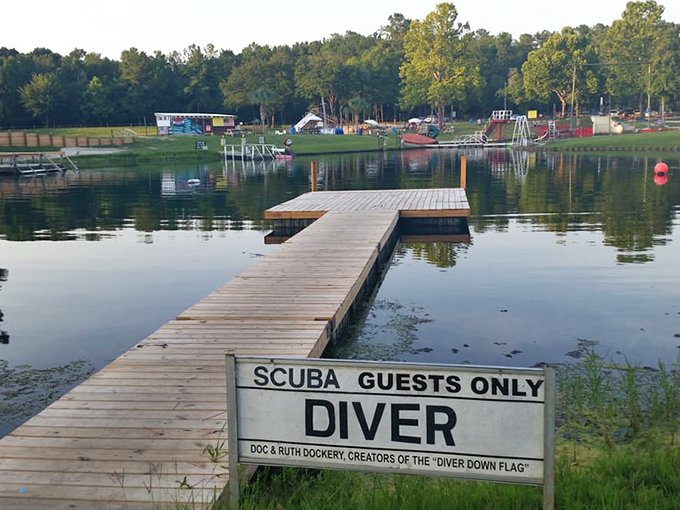 A wooden dock reserved for divers &ndash; the gateway between two worlds where humans temporarily transform into honorary fish.