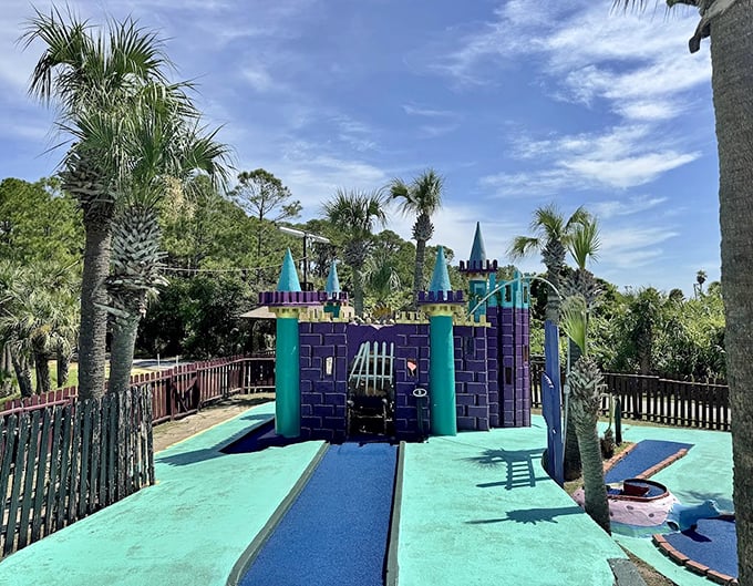The purple castle stands like a Floridian Camelot, where the knights carry putters and the dragons are made of concrete.
