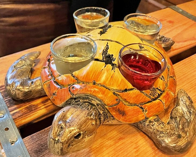 Wine sampler: A charming turtle-shaped wooden holder cradles four different wines, offering a taste journey through Florida's fruit bounty.