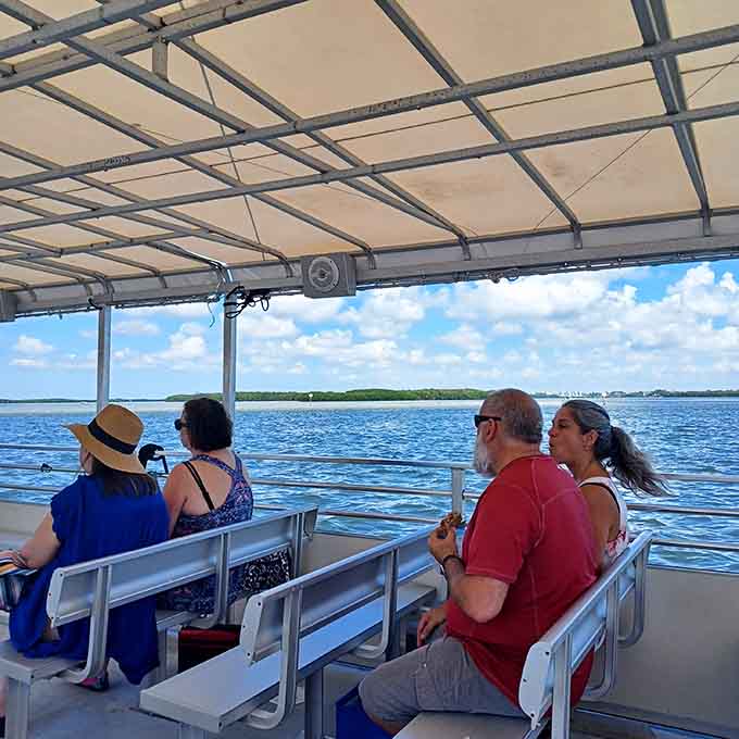The covered shuttle provides shade for the crossing, because even adventures to pristine islands should include some basic creature comforts.