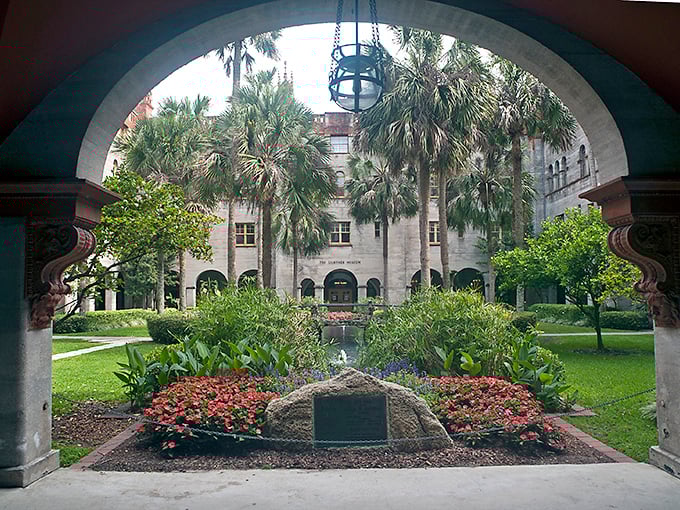 Looking through the arched entryway reveals the courtyard's secret garden &ndash; a moment of discovery that feels like stumbling upon a hidden treasure.