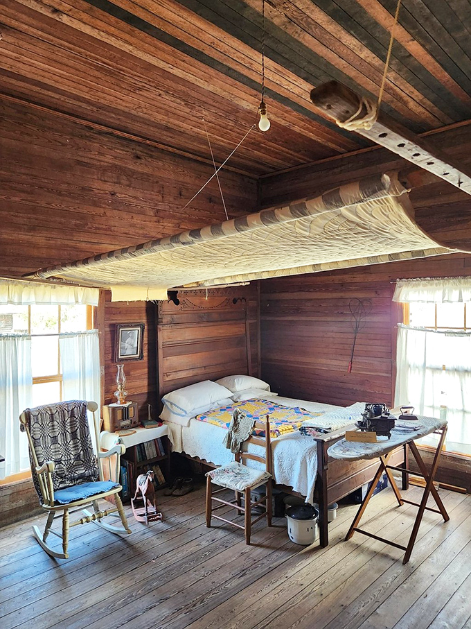 Pioneer bedrooms featured ingenious space-saving solutions, like this ceiling-mounted baby cradle that could be gently rocked from the comfort of bed.
