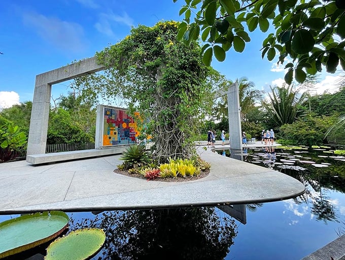 A modern architectural frame creates a living picture, showcasing the garden's blend of art and nature.