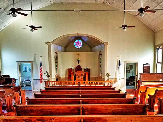 Simple wooden pews and stunning stained glass create a sanctuary where generations have marked life's most significant moments.