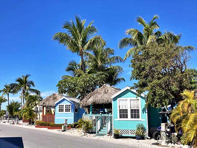 These colorful beach cottages look like they escaped from a Caribbean postcard and decided Florida was close enough to home.