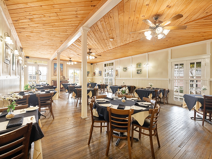 The Island Hotel's dining room welcomes guests with warm wood tones and simple elegance &ndash; unpretentious yet undeniably special.