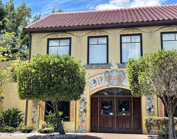 The building's ornate entrance features beautiful painted details that transport you straight to a European village, minus the jet lag and expensive airfare.