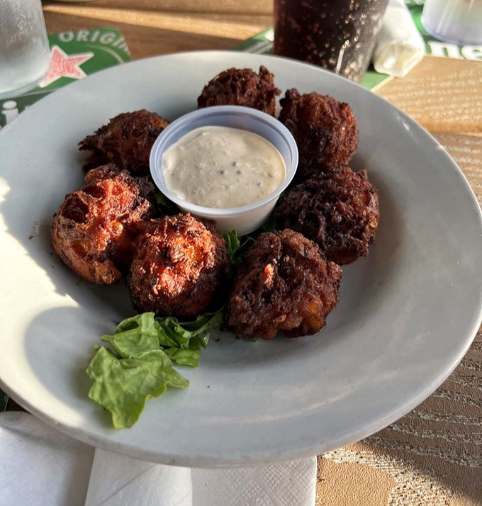 These hush puppies aren't just quiet &ndash; they're practically silent until that first satisfying crunch reveals their tender cornmeal soul.