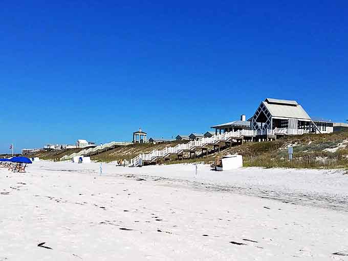 Beach homes perch atop dunes like colorful sentinels, their stilted foundations respecting nature's need for shifting sands.