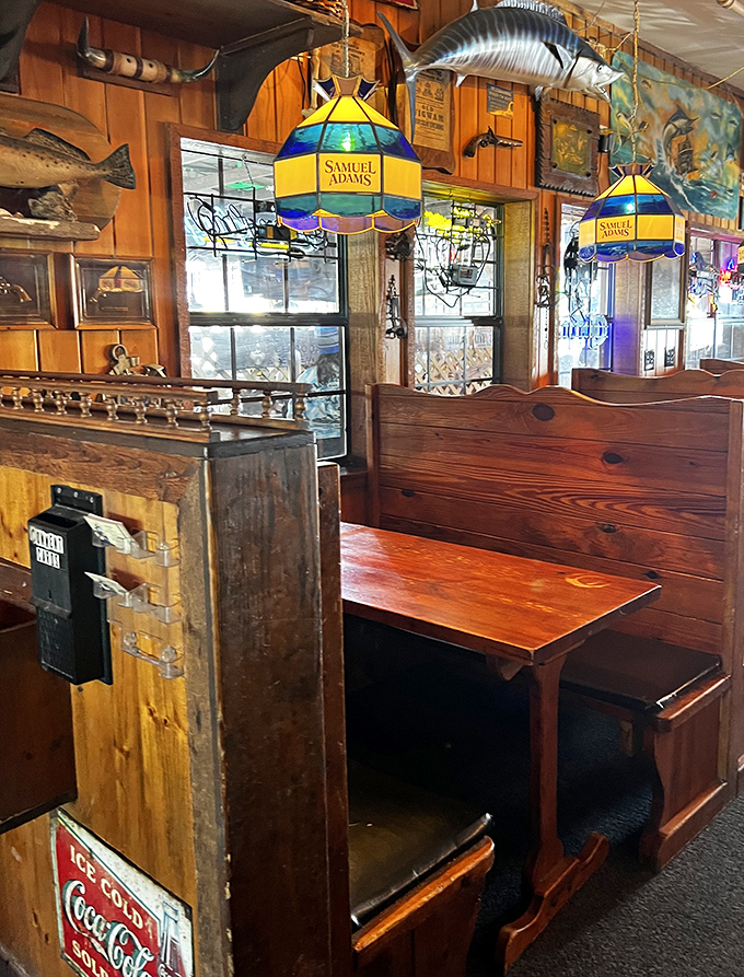 Cozy wooden booths bathed in the warm glow of stained-glass lamps &ndash; the perfect spot to tuck into a seafood feast while surrounded by maritime history.