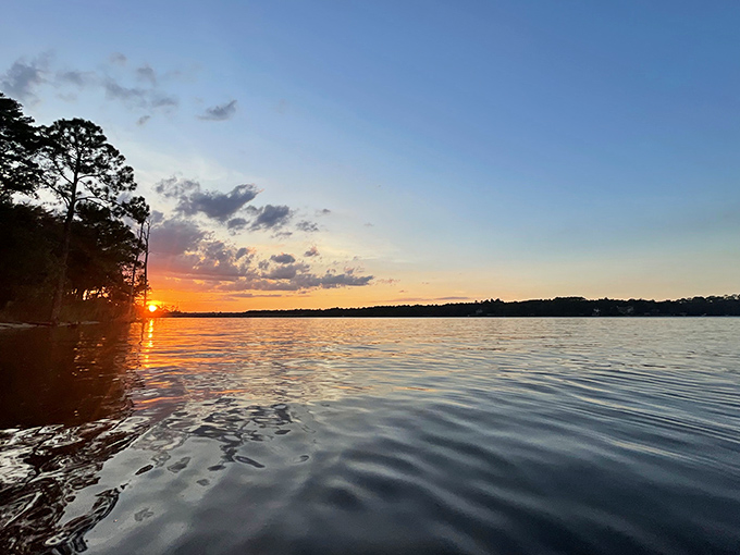 Mother Nature's nightly light show turns Rocky Bayou into a painter's palette of oranges, pinks and purples.