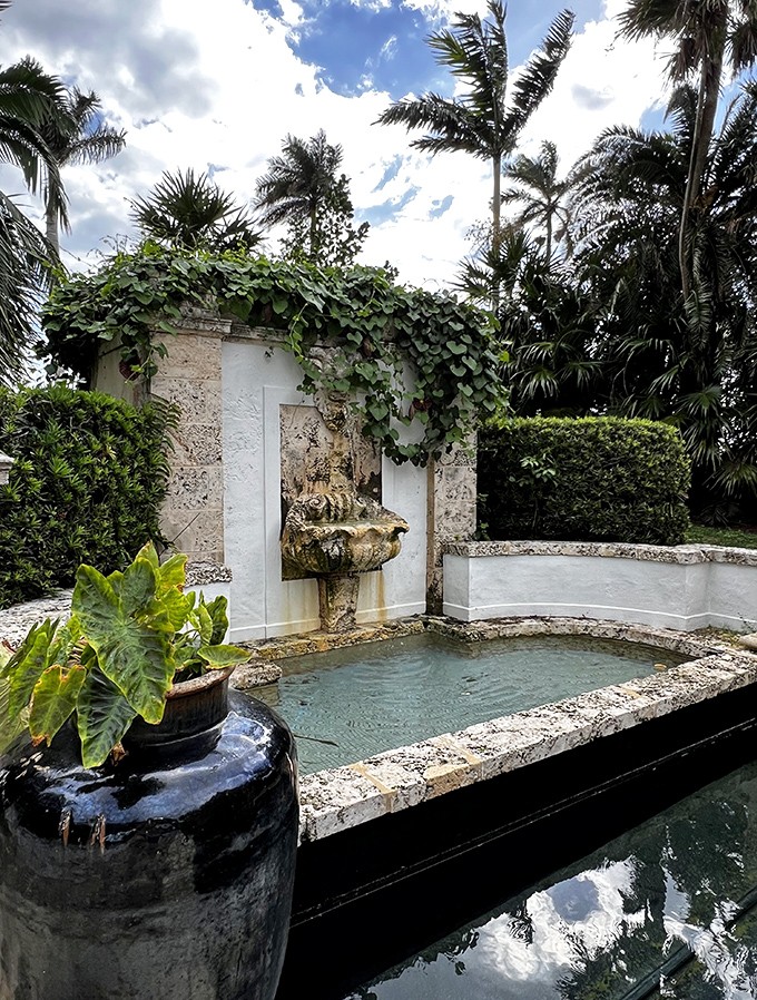 A serene water feature offers reflection in more ways than one, its ancient fountain head whispering stories of bygone eras.