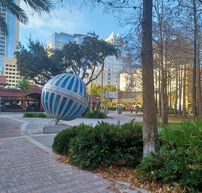 Surrounded by lush Florida greenery, the sculpture creates a perfect juxtaposition of natural and man-made elements, each enhancing the other's beauty.