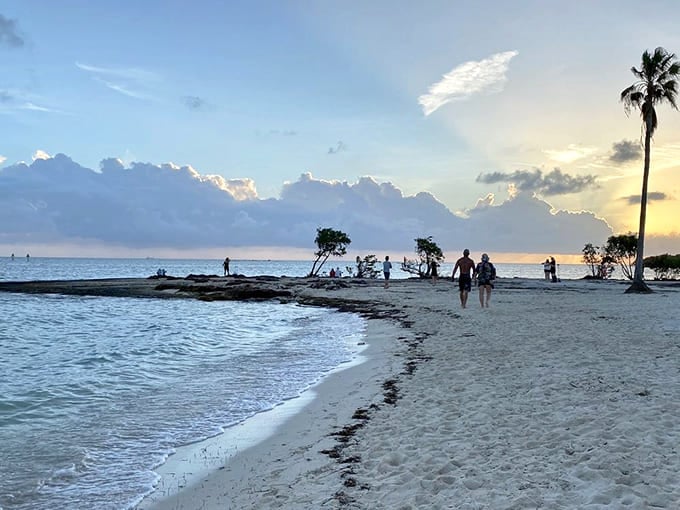Palm trees, gentle waves, and evening strolls make this beach feel welcoming without losing its relaxed charm.