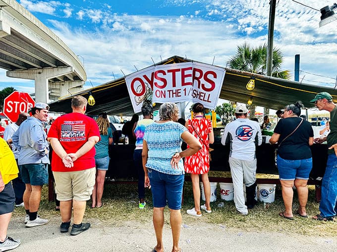 Oyster vendors work their magic behind rustic displays, shucking fresh bivalves for crowds who know that Florida does seafood right.