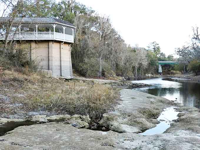 The once-famous White Sulfur Springs bathhouse has vanished, leaving only stone steps leading down to the water.
