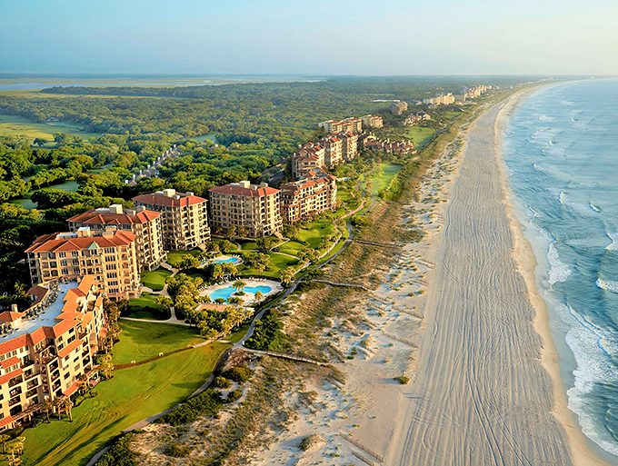 Aerial view of Amelia Island's coastline, where luxury accommodations meet pristine beaches and lush maritime forests. Paradise found!