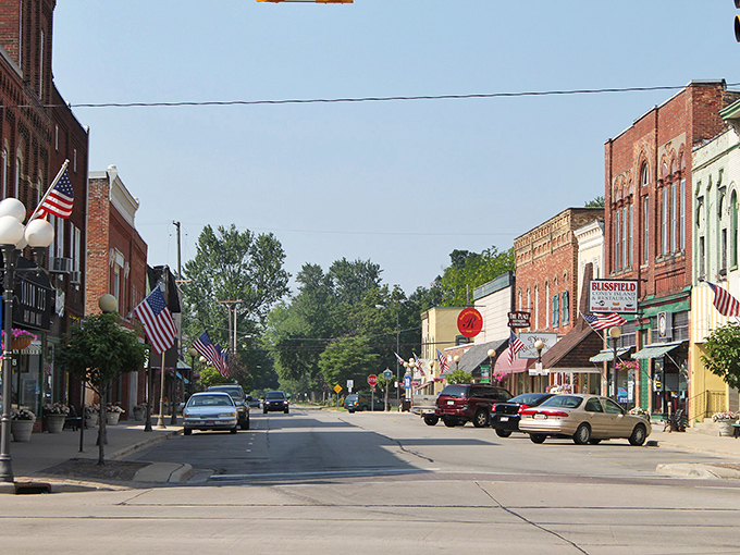 Blissfield's main street welcomes visitors with classic small-town charm and American flags that aren't just for show – they're a way of life.