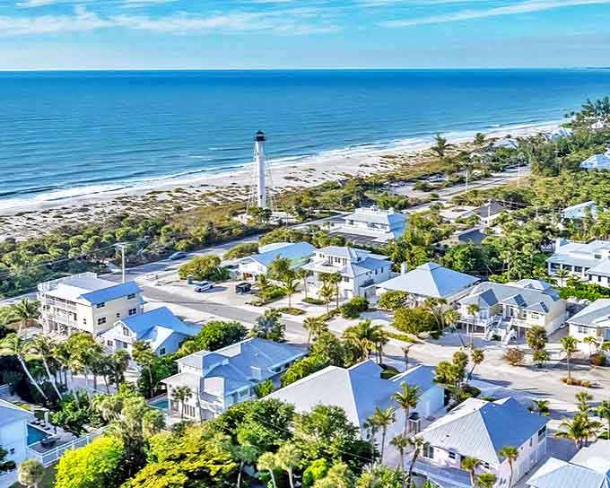 Aerial view of Boca Grande showcasing the pristine coastline and iconic lighthouse standing guard over paradise.