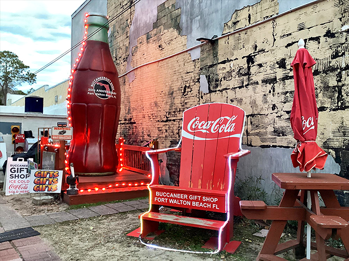 The giant Coca-Cola bottle outside Buccaneer Gift Shop stands like a carbonated lighthouse, guiding thirsty collectors to this temple of fizzy memorabilia.
