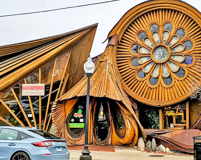 Chez Olga's fantastical wooden exterior looks like a Caribbean dream sequence, complete with a flower-shaped window that practically winks at passersby.