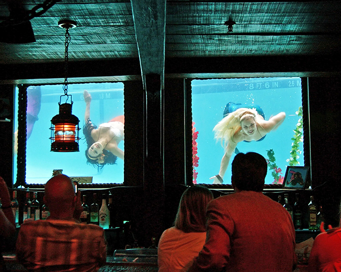 Mermaids glide through aquamarine windows, turning cocktail hour into an underwater fantasy. The ultimate dinner theater happens when you least expect it.