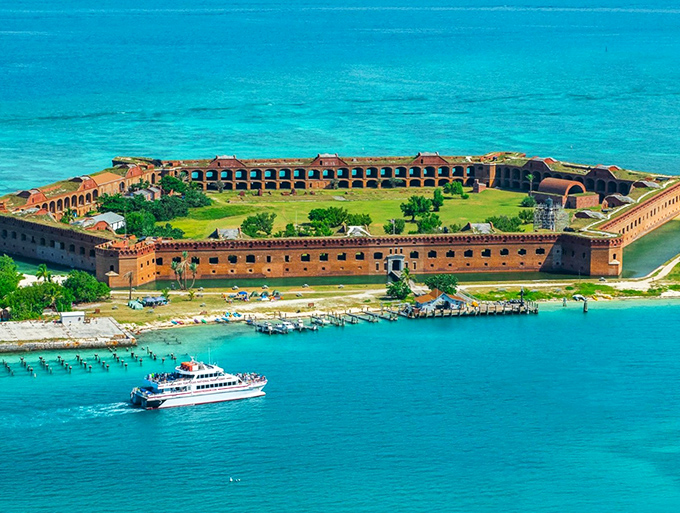 Fort Jefferson rises from turquoise waters like a brick mirage, the crown jewel of Dry Tortugas National Park.
