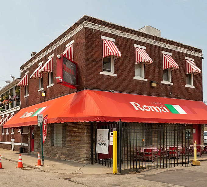 Exterior: The iconic red awning and classic brick facade of Amore da Roma stand as a beacon of Italian tradition in Detroit's Eastern Market district.