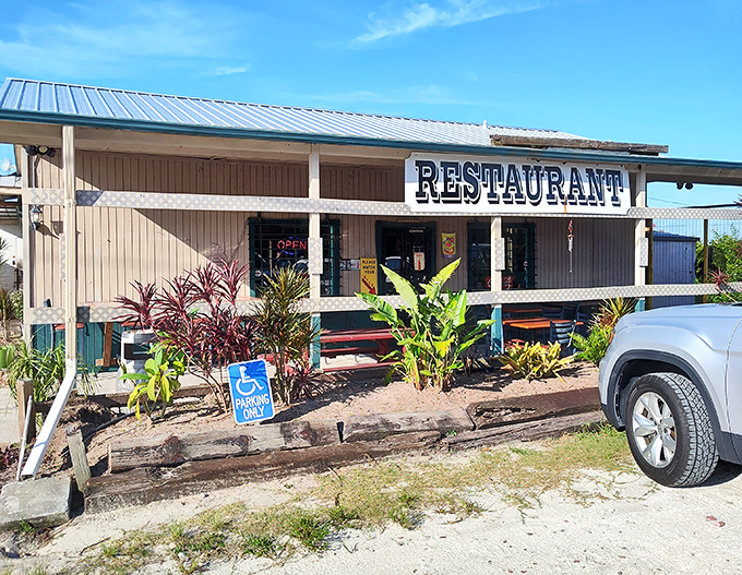 Unassuming yet inviting, Route 60 Diner's simple facade hides culinary treasures within. The beige building with its straightforward "RESTAURANT" sign promises authentic Florida roadside dining.