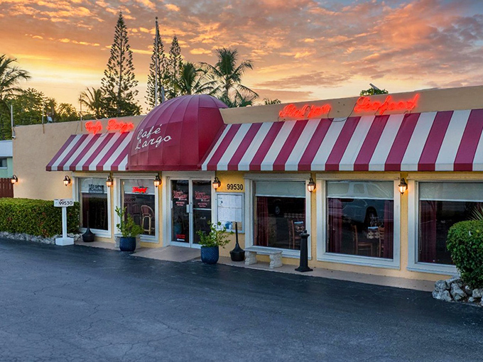 DiGiorgio's iconic red and white awning glows at sunset, a beacon of Italian culinary delight in the heart of Key Largo.
