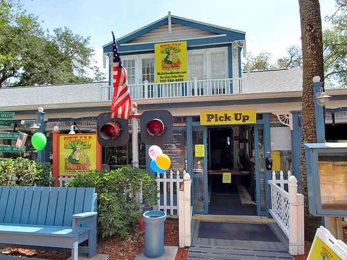 A slice of old Florida charm awaits at this blue-hued seafood haven, where the American flag waves as proudly as the restaurant's reputation for exceptional grouper.