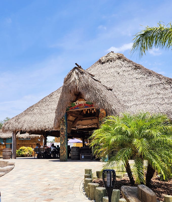 Paradise found! The iconic thatched roof of Crump's Landing welcomes visitors with the promise of tropical drinks and Florida sunshine.