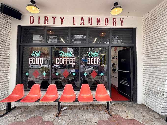 Red vintage seats invite curious passersby to this laundromat fa&ccedil;ade with promises of "Hot Food, Fresh Coffee, Cold Beer" &ndash; Miami's most delicious deception begins here.