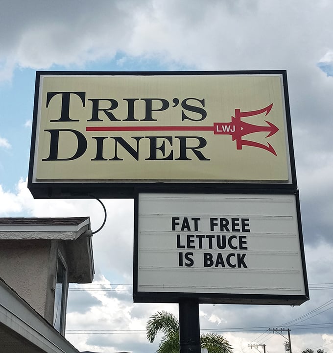 Trip's Diner's iconic sign promises "Fat Free Lettuce Is Back" – a wink and nod that perfectly captures this Florida eatery's playful personality.
