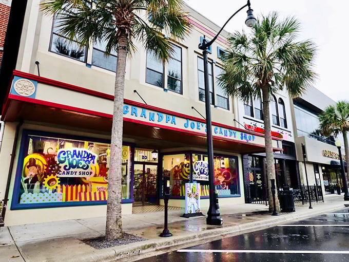 Palm trees stand guard outside this candy kingdom, where the blue and red fa&ccedil;ade promises sweet adventures within.