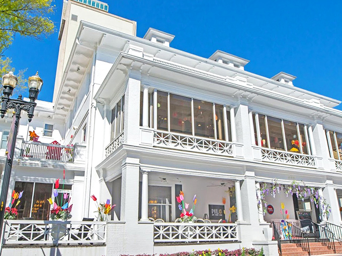 A grand white colonial mansion with wrap-around porches transforms into Jacksonville's sweetest destination. Candy dreams in architectural form!