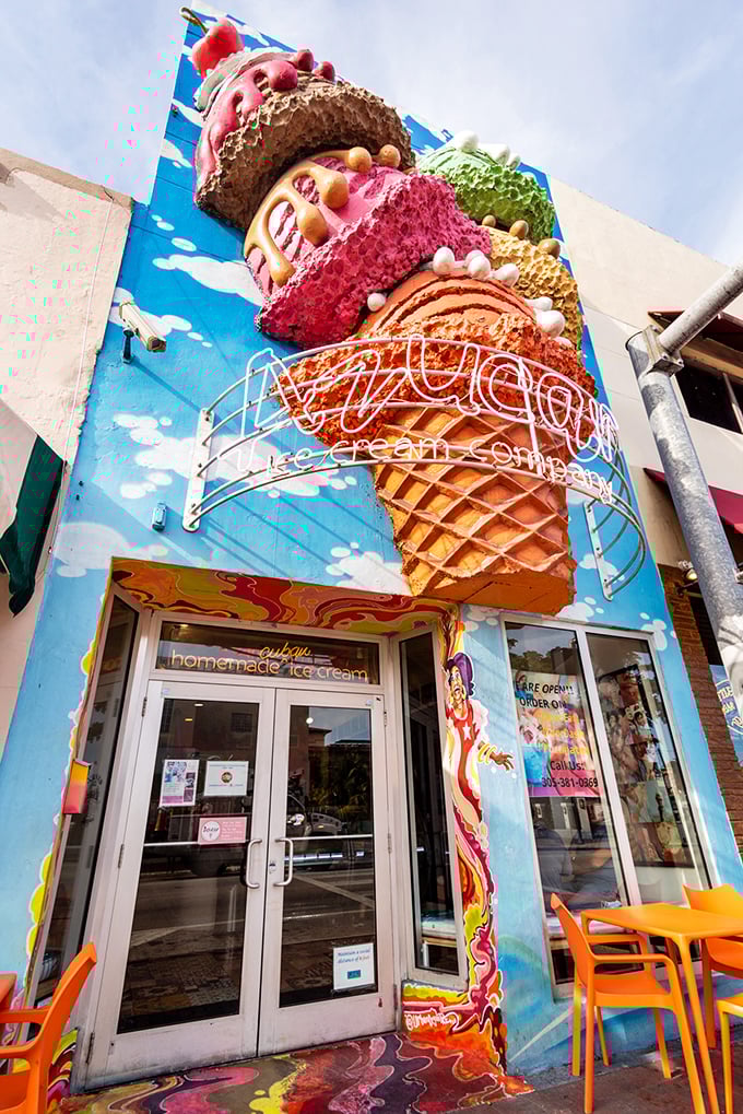 A towering ice cream sculpture adorns Azucar's vibrant blue facade, standing like a sweet sentinel on Calle Ocho. Miami's most photogenic dessert landmark!