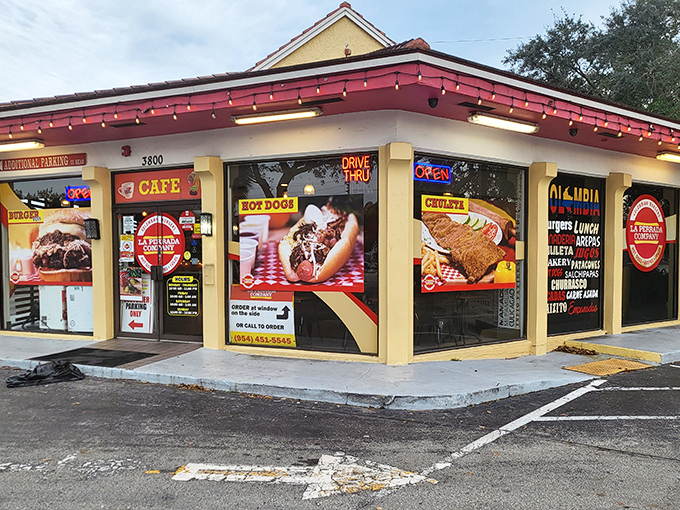The unassuming yellow building with vibrant red trim houses flavor explosions that would make your standard hot dog weep with inadequacy.