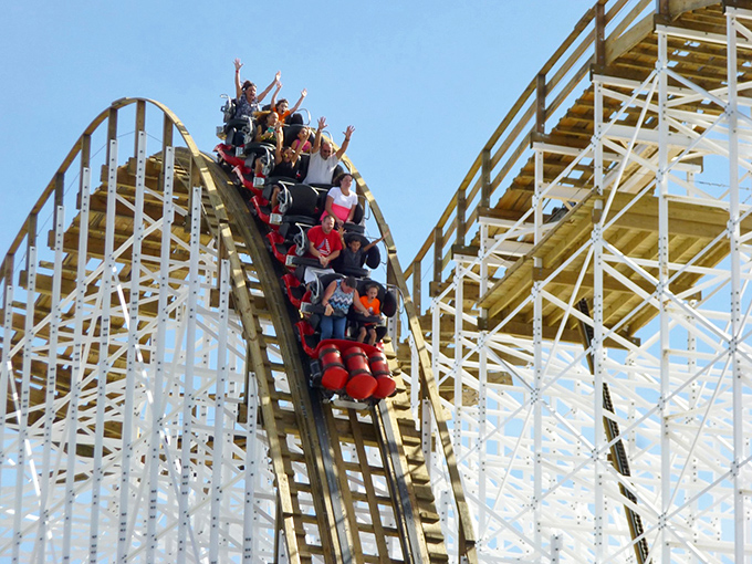 White Lightning delivers that perfect blend of nostalgic wooden coaster rattle and heart-stopping drops – like riding a thunderstorm made of timber.